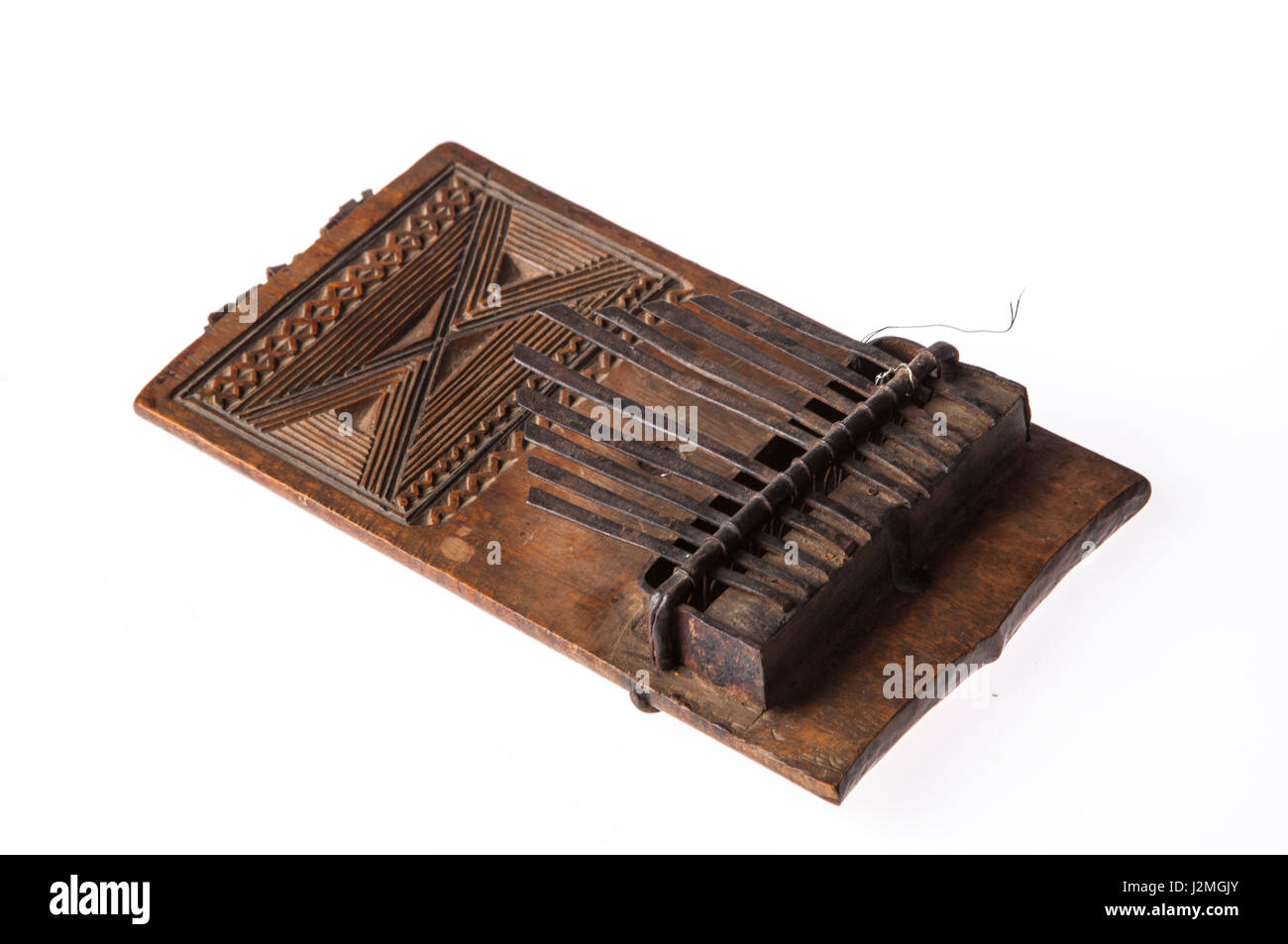 African handmade music instrument isolated on white background Stock ...