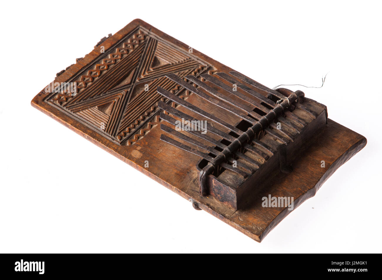 African handmade music instrument isolated on white background Stock ...