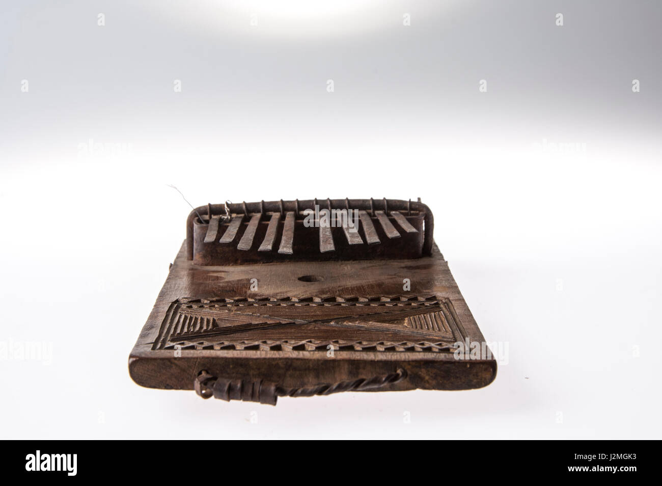 African handmade music instrument isolated on white background Stock ...