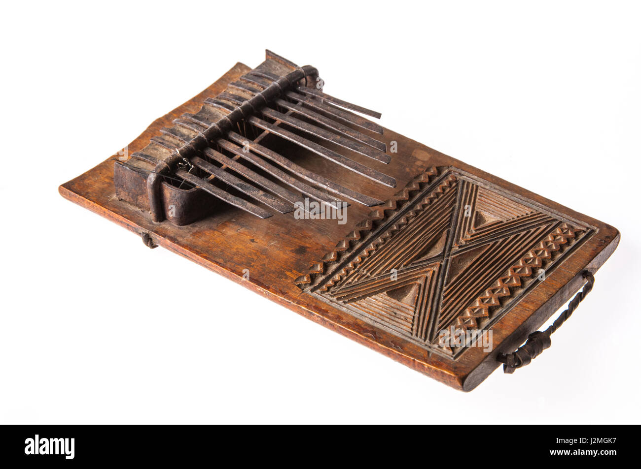 African handmade music instrument isolated on white background Stock ...