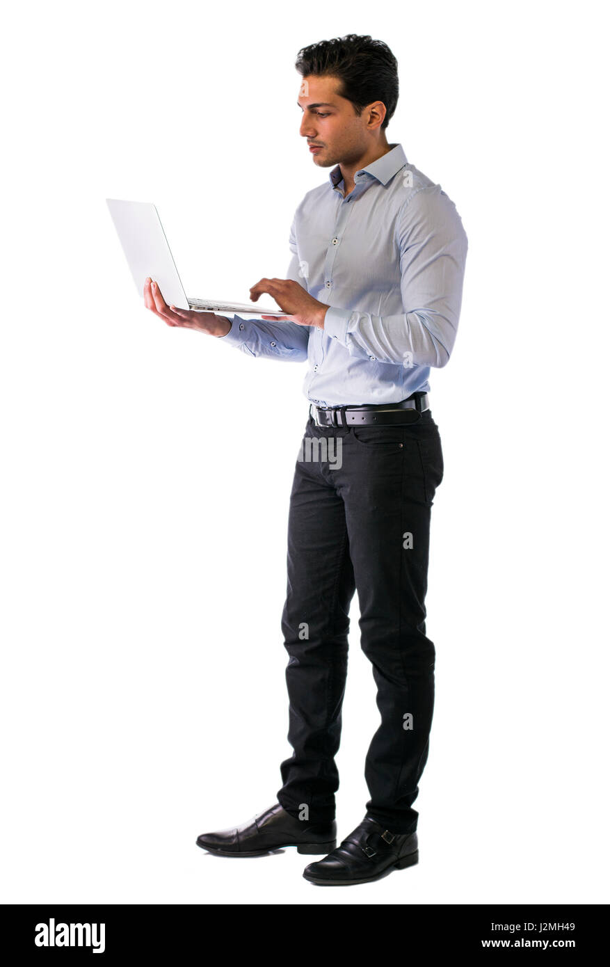 Happy guy working laptop typing Cut Out Stock Images & Pictures - Alamy