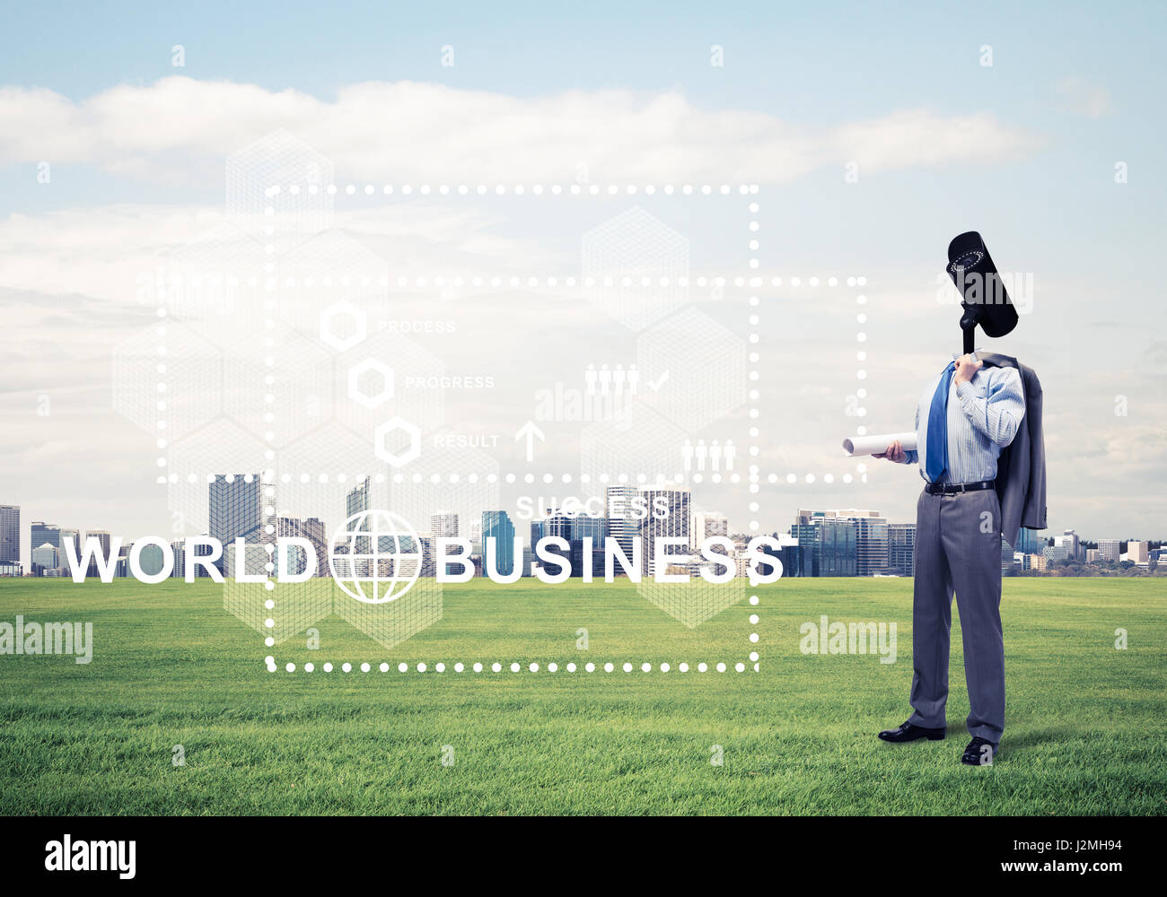 Camera headed man standing on green grass against modern citysca Stock ...