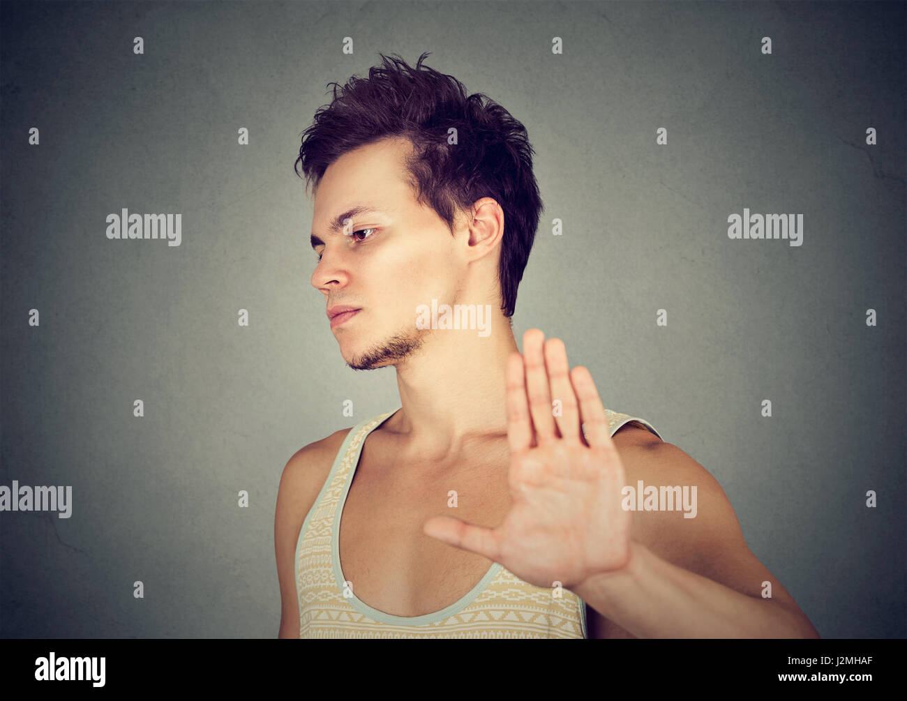 Closeup portrait young annoyed angry man with bad attitude giving talk ...