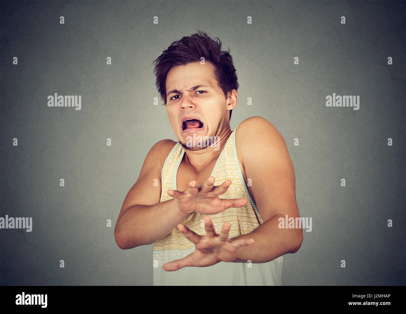 Portrait disgusted young man. Negative human emotion Stock Photo - Alamy