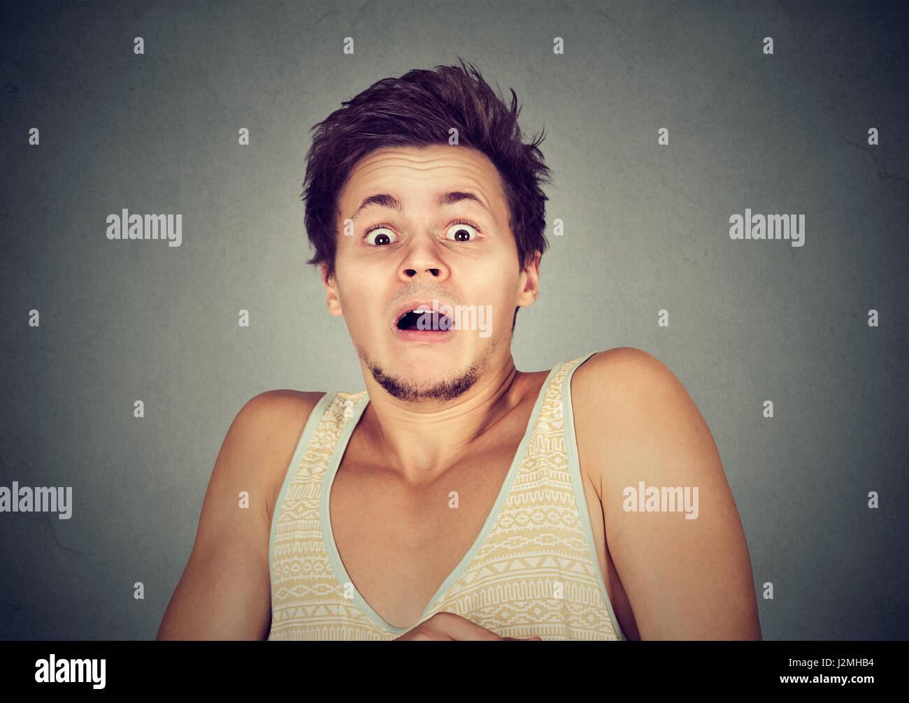 young man looking shocked scared Stock Photo - Alamy