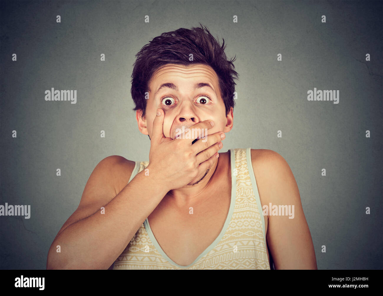 young man looking shocked scared Stock Photo - Alamy