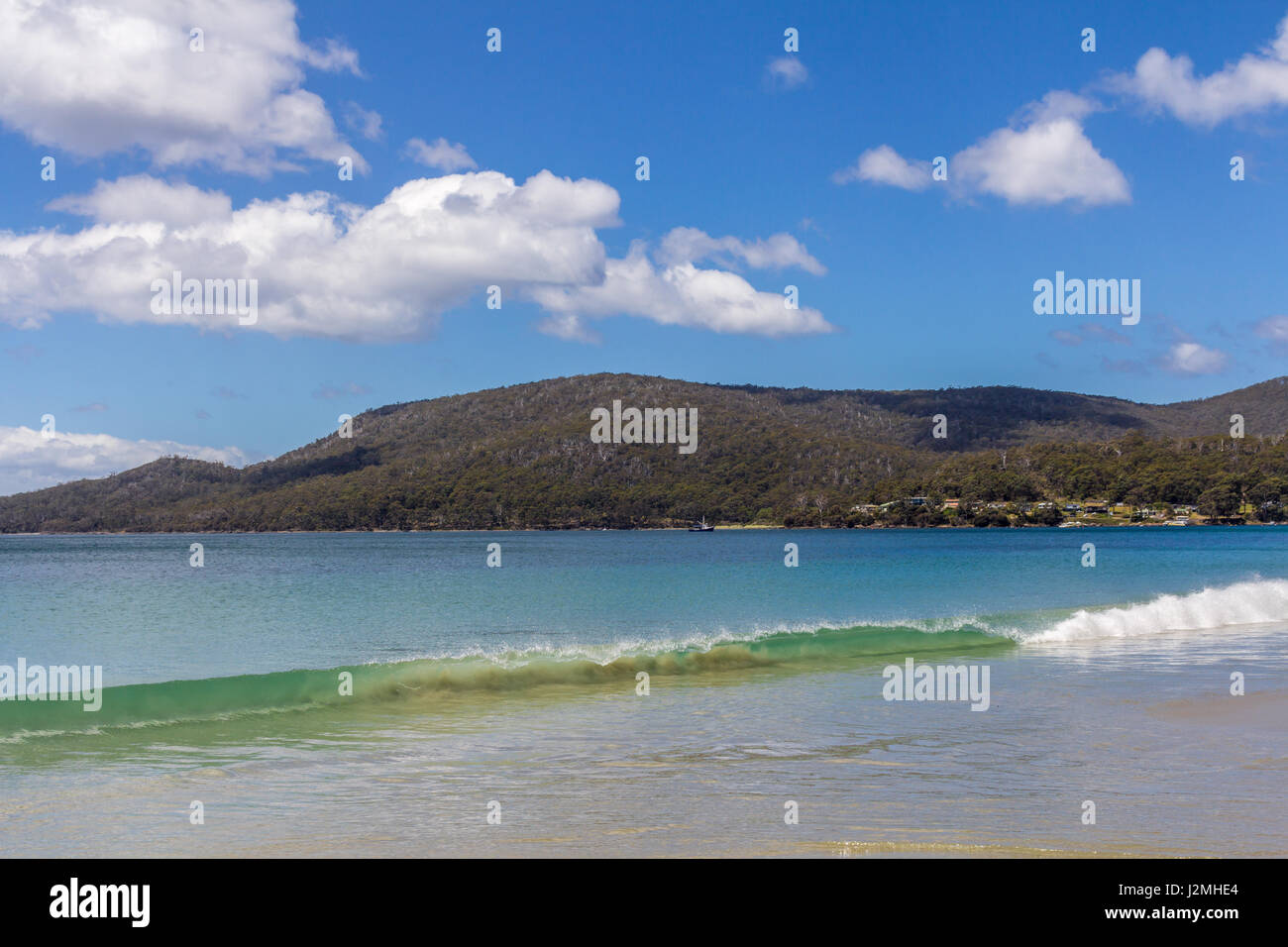 Wave breaking on Adventure Bay beach Tasmania, Australia Stock Photo ...