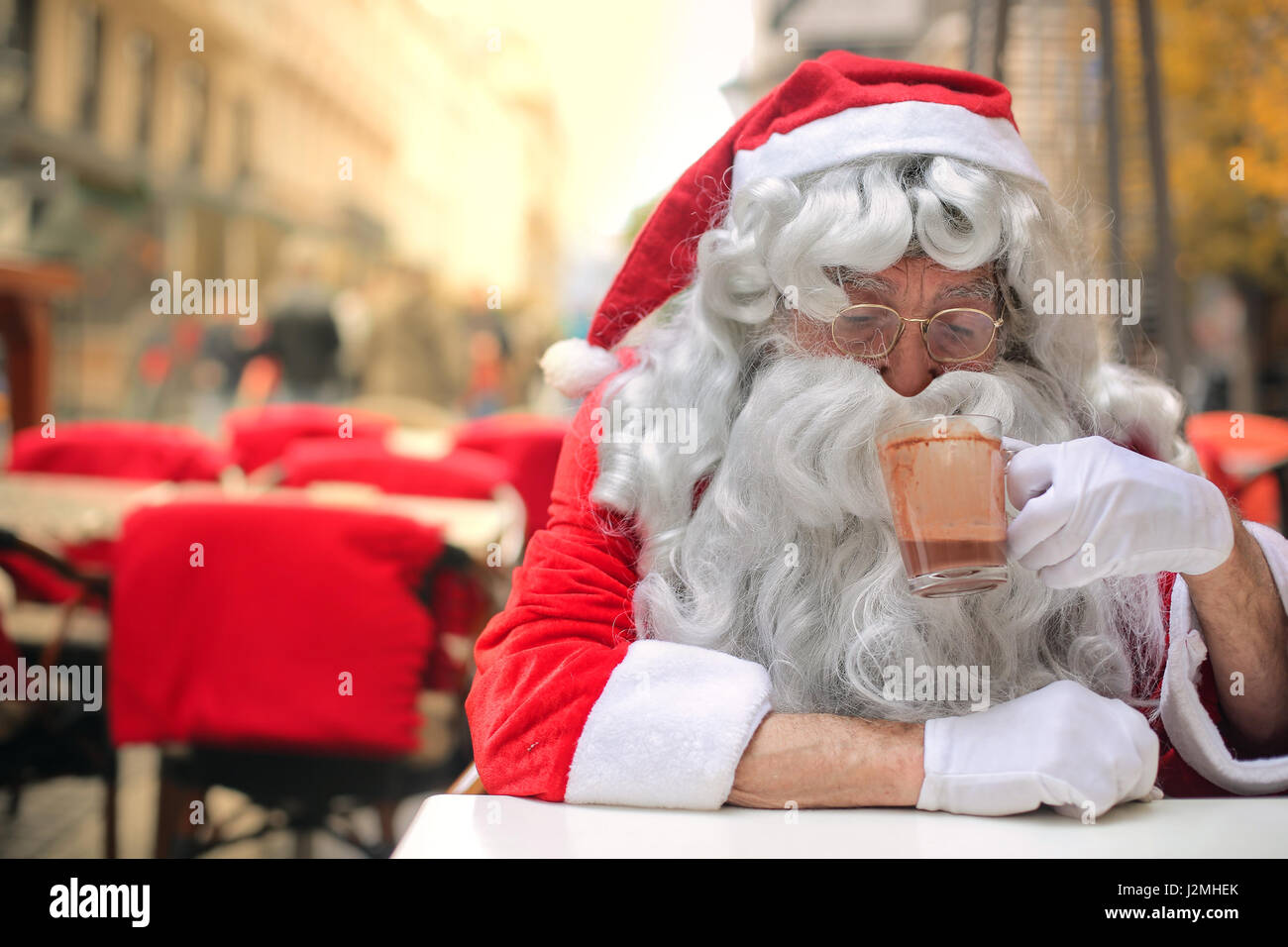 Santa Claus drinking coffee Stock Photo - Alamy