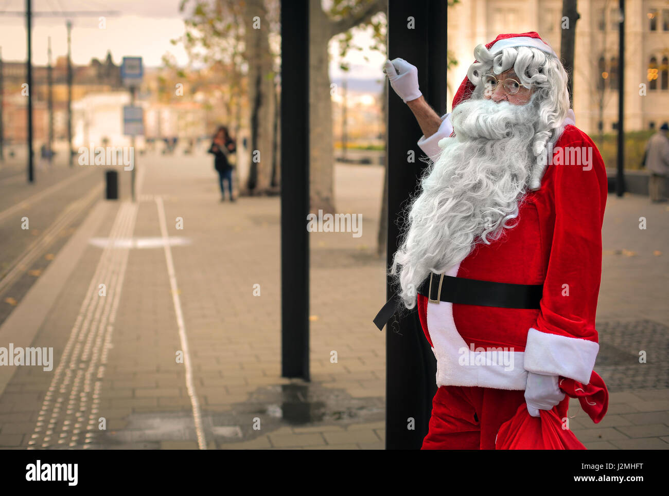 Santa Claus standing outside Stock Photo - Alamy
