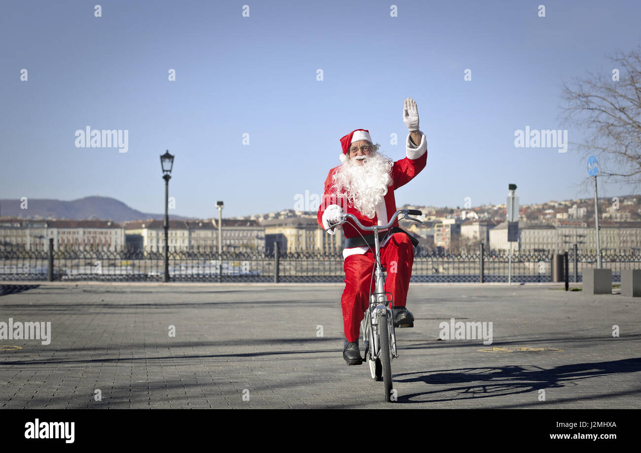 Santa Riding Bike High Resolution Stock Photography and Images - Alamy