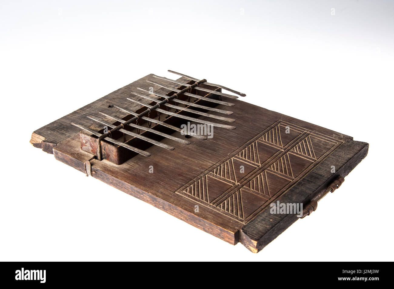 African handmade music instrument isolated on white background Stock ...