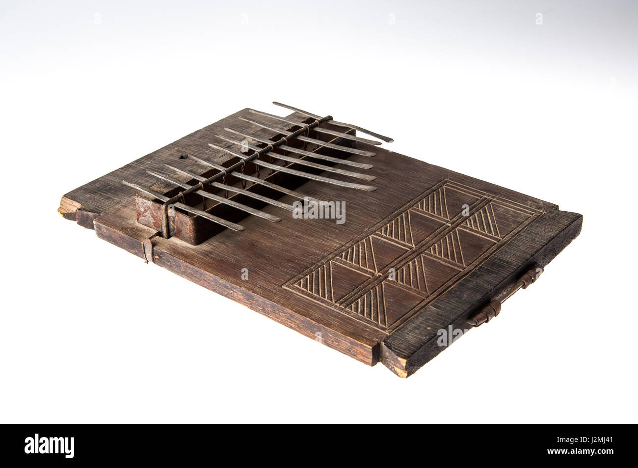 African handmade music instrument isolated on white background Stock ...