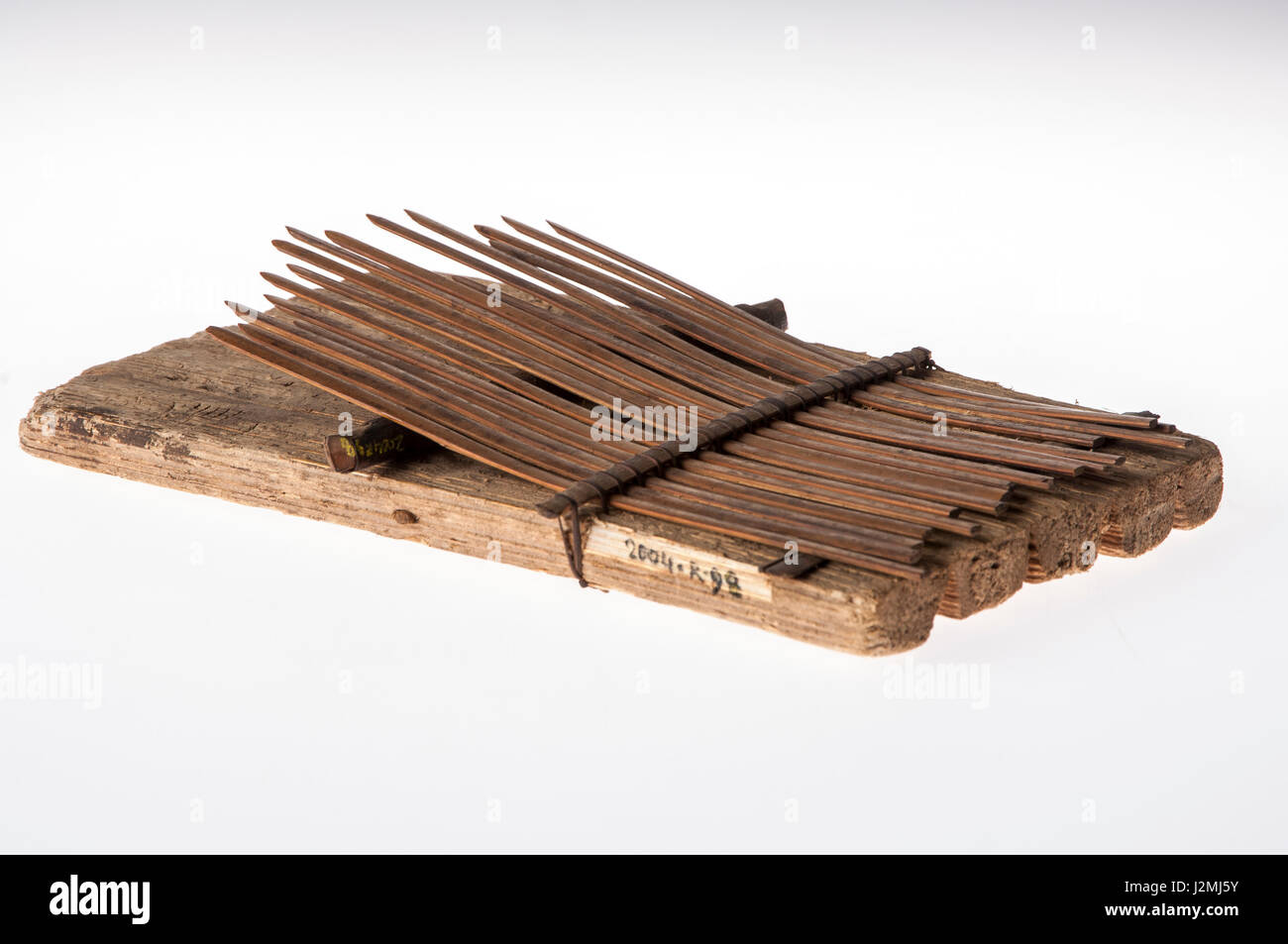 African handmade music instrument isolated on white background Stock ...