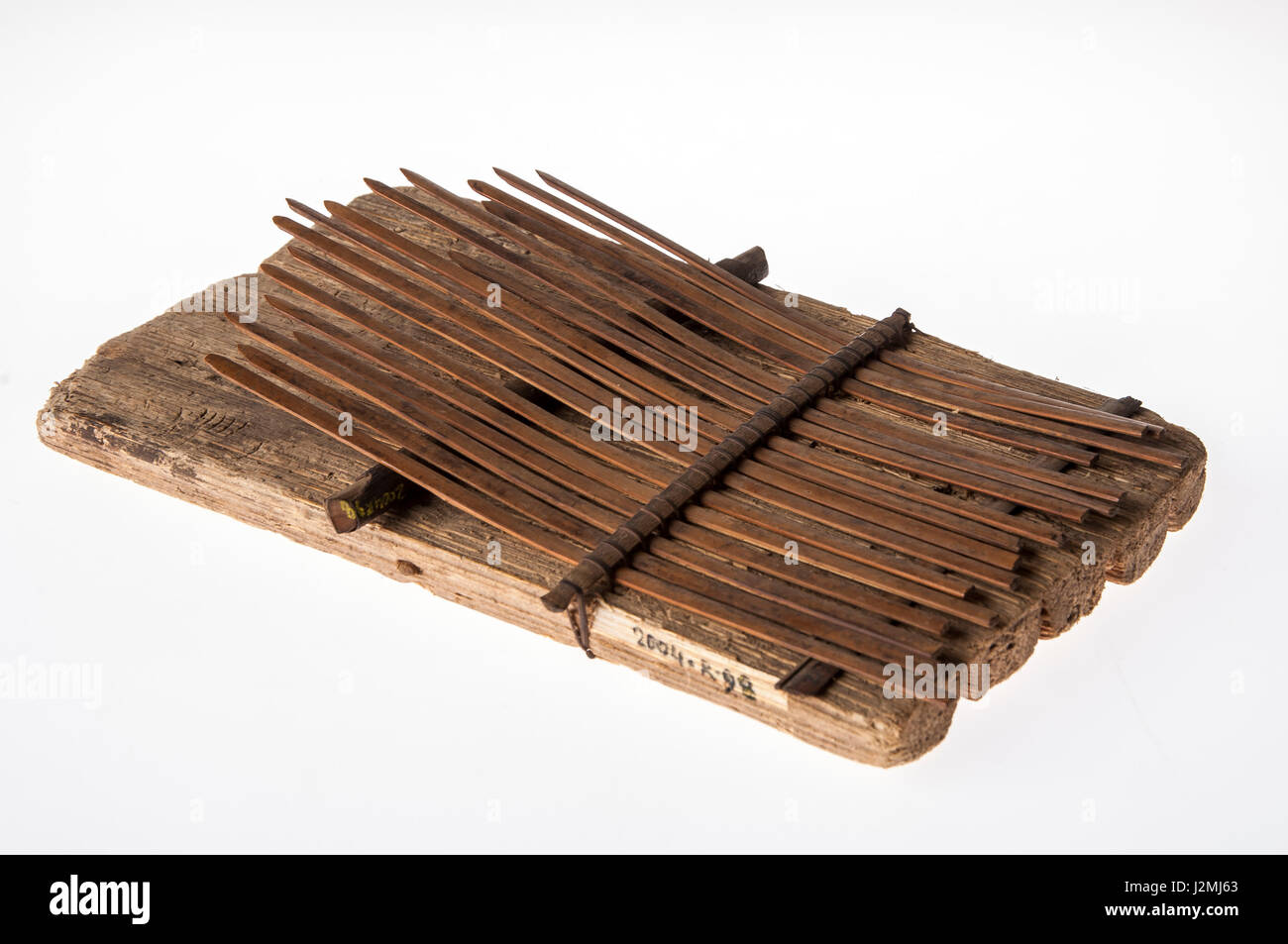 African handmade music instrument isolated on white background Stock ...