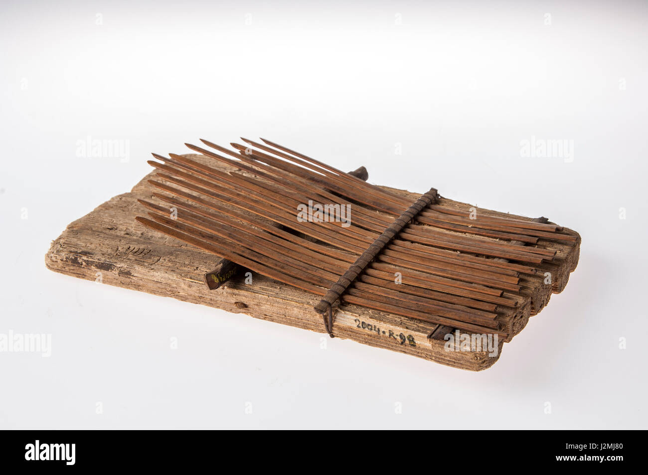 African handmade music instrument isolated on white background Stock ...