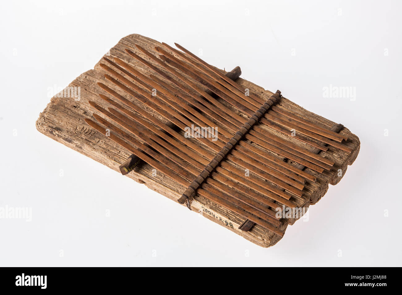 African handmade music instrument isolated on white background Stock ...