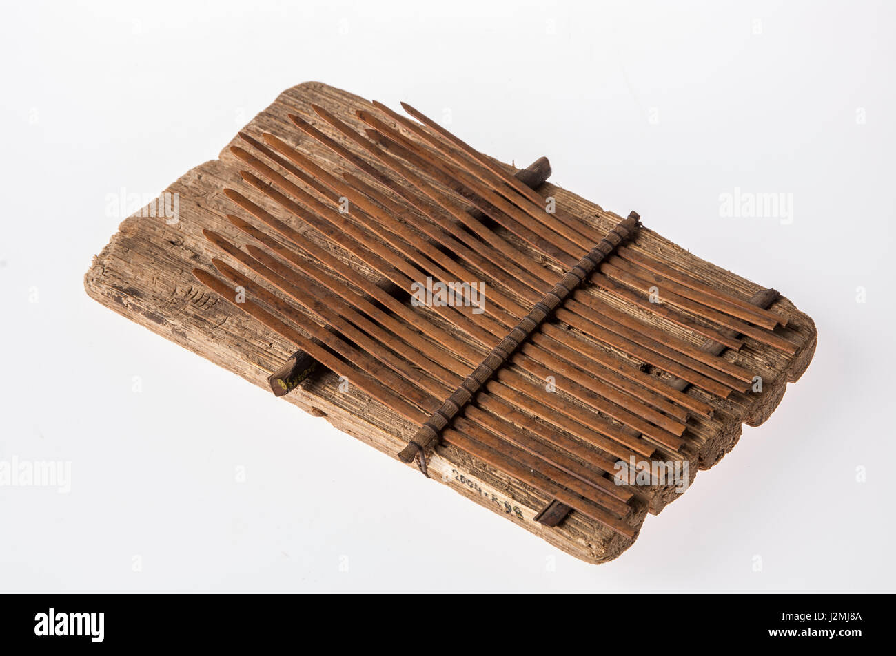 African handmade music instrument isolated on white background Stock ...