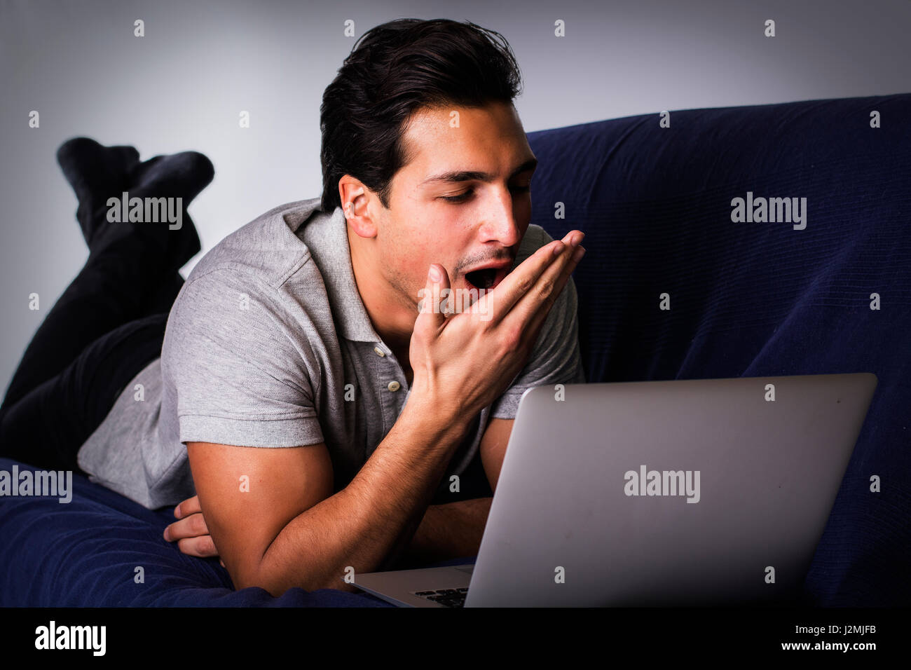 Young man yawning hi-res stock photography and images - Alamy