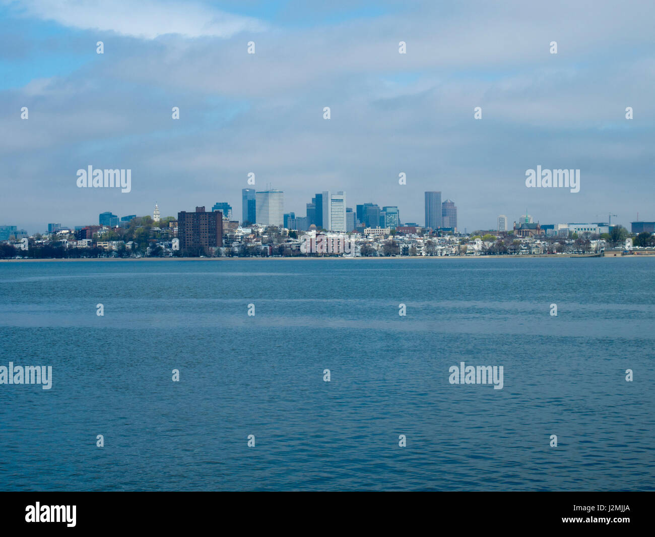 A view of the skyline across Boston Harbor in Massachusetts Stock Photo ...