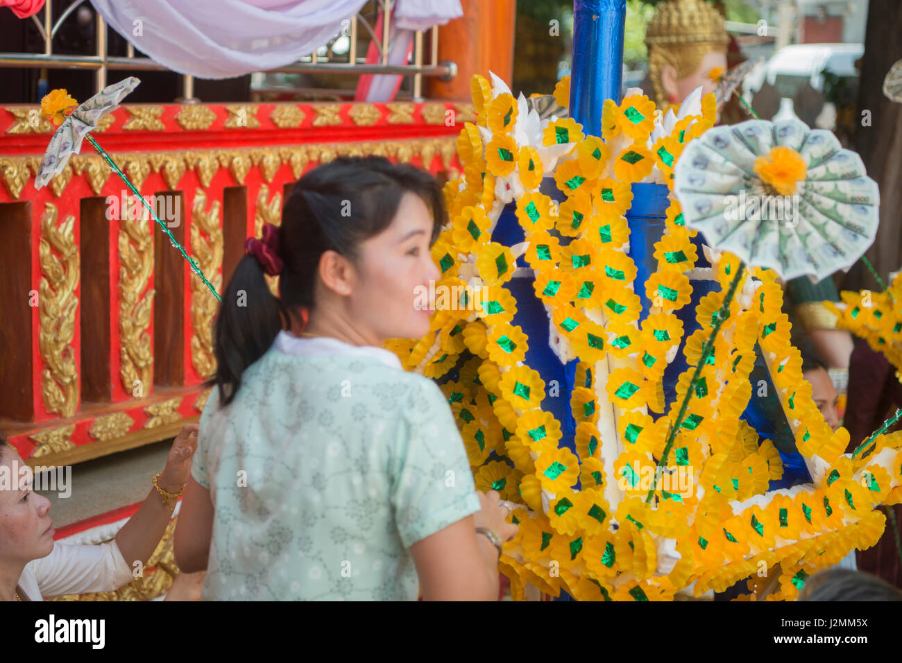 wax castle at a ceremony at the Wat Si Muang Temple on the That Luang ...