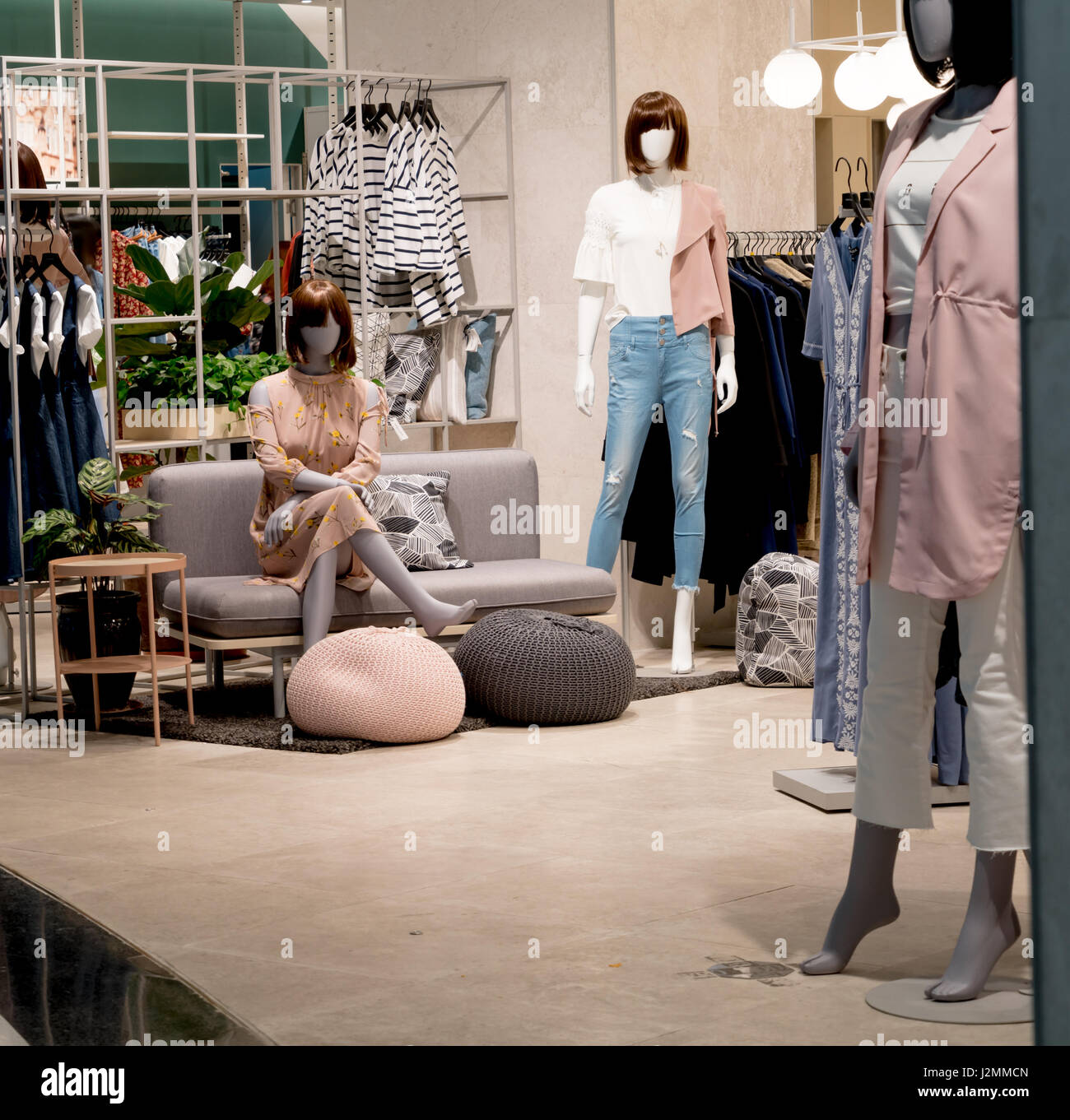 Girl models display the fashion clothes in the shopping mall Stock ...