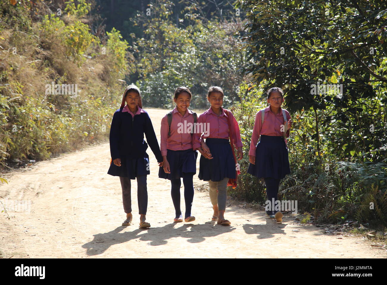 School kids walking in the countryside hi-res stock photography and ...