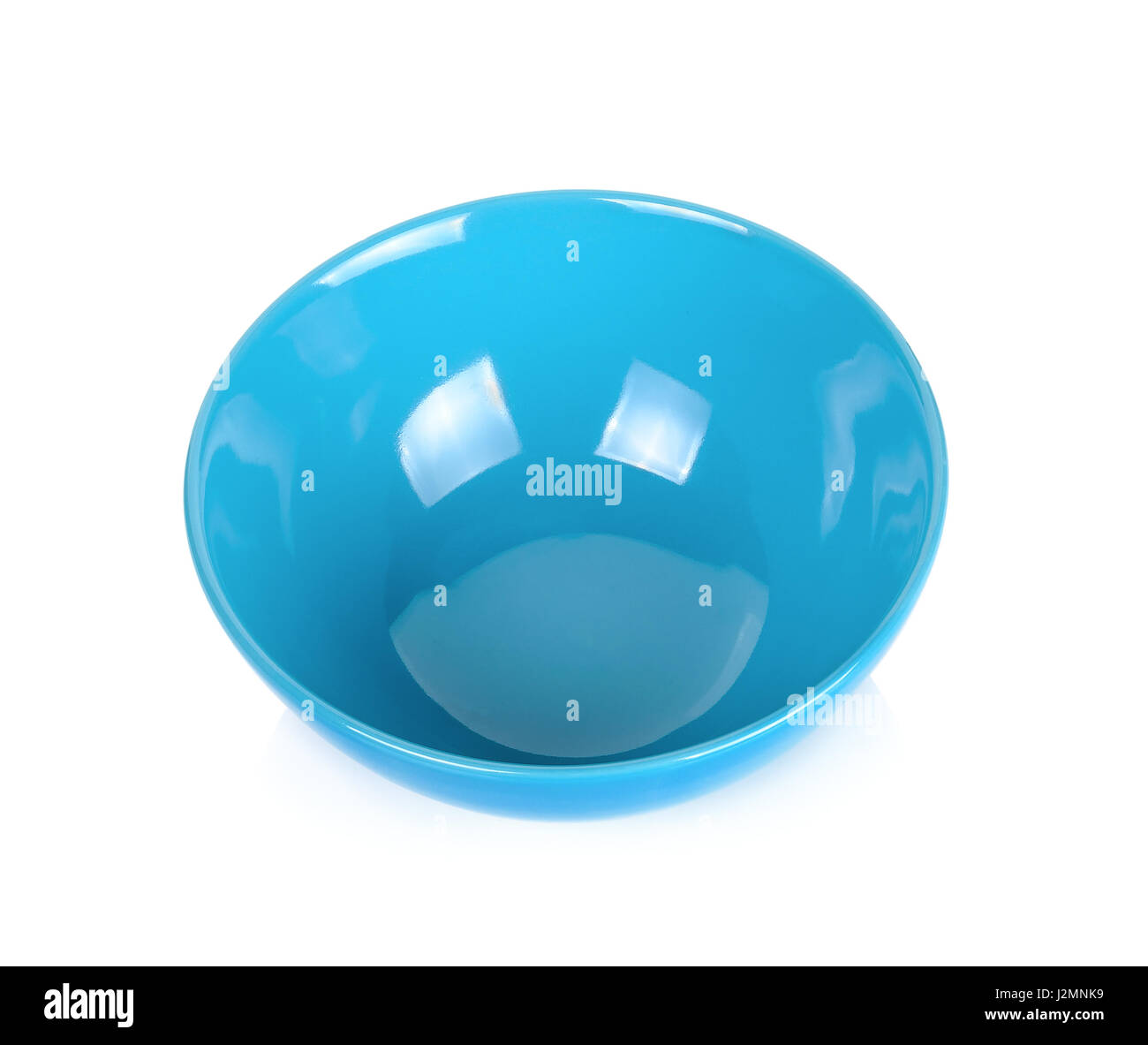 Blue bowl isolated on the white background Stock Photo - Alamy