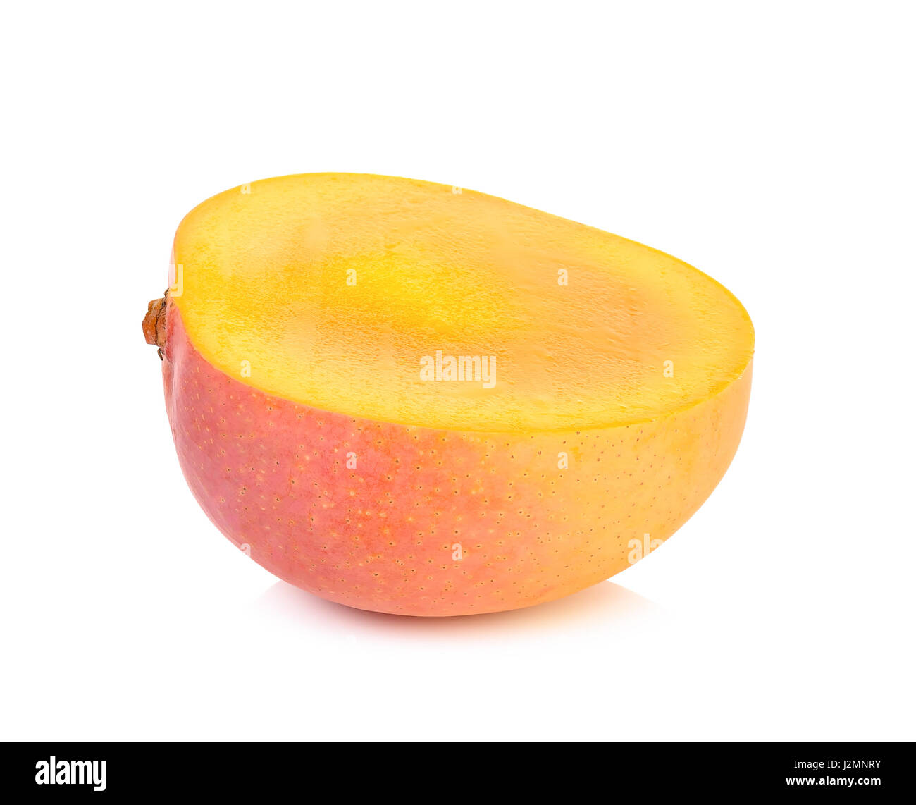 Half of Ripe mango isolated on the white background Stock Photo - Alamy
