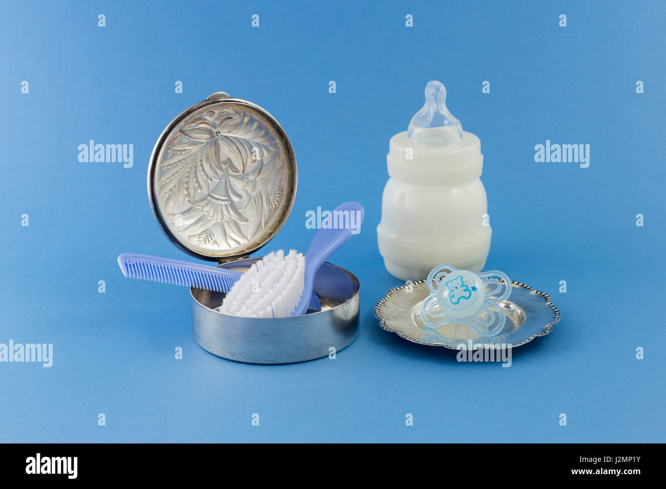 Baby boy luxurious items collection isolated on pale blue background ...