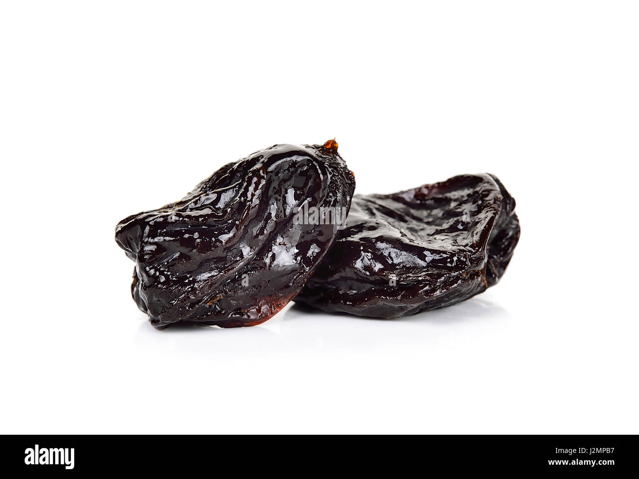 Dried Prune isolated on the white background Stock Photo - Alamy