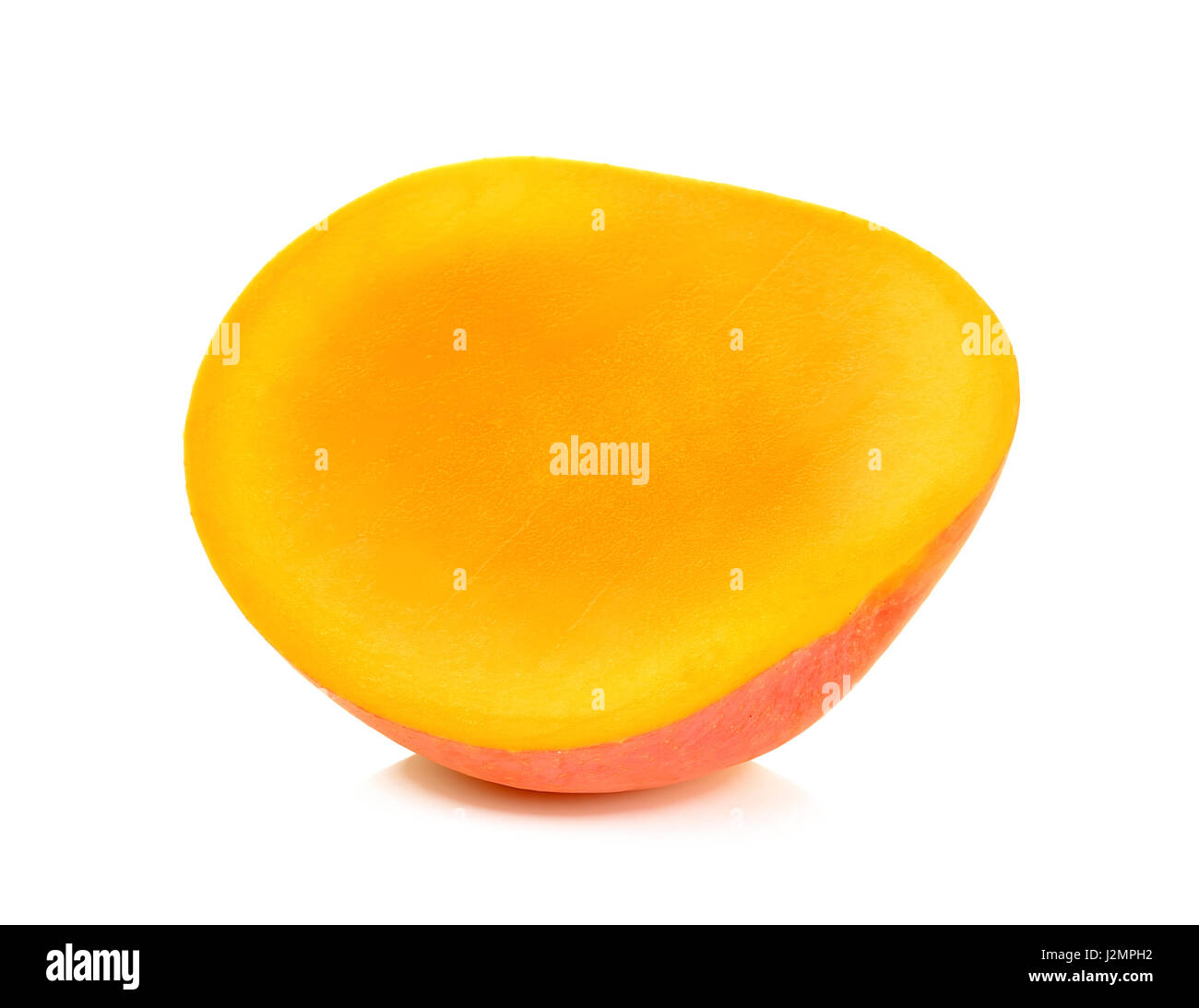 Half of Ripe mango isolated on the white background Stock Photo - Alamy