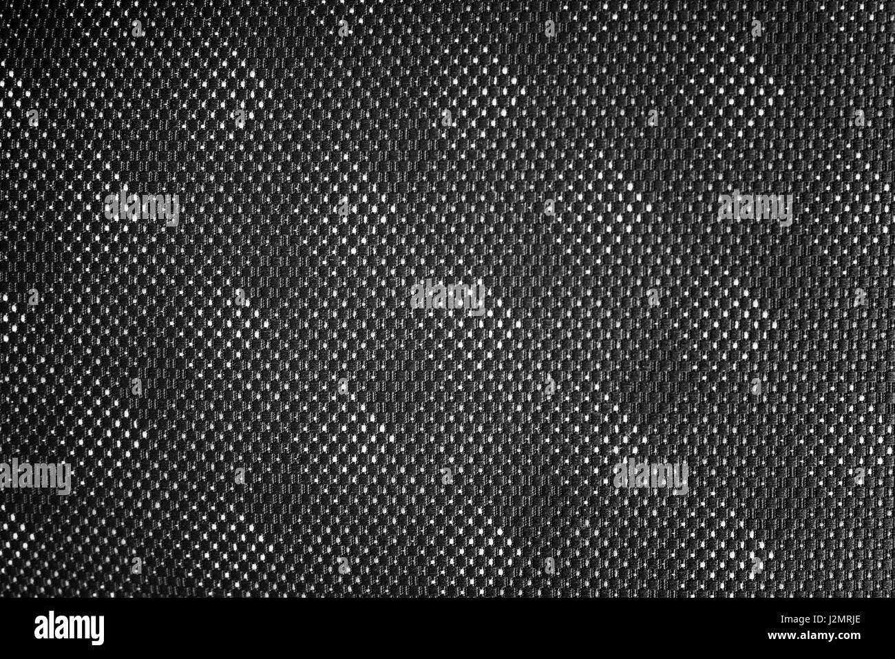 Dark background of perforated fabric for your creativity Stock Photo ...