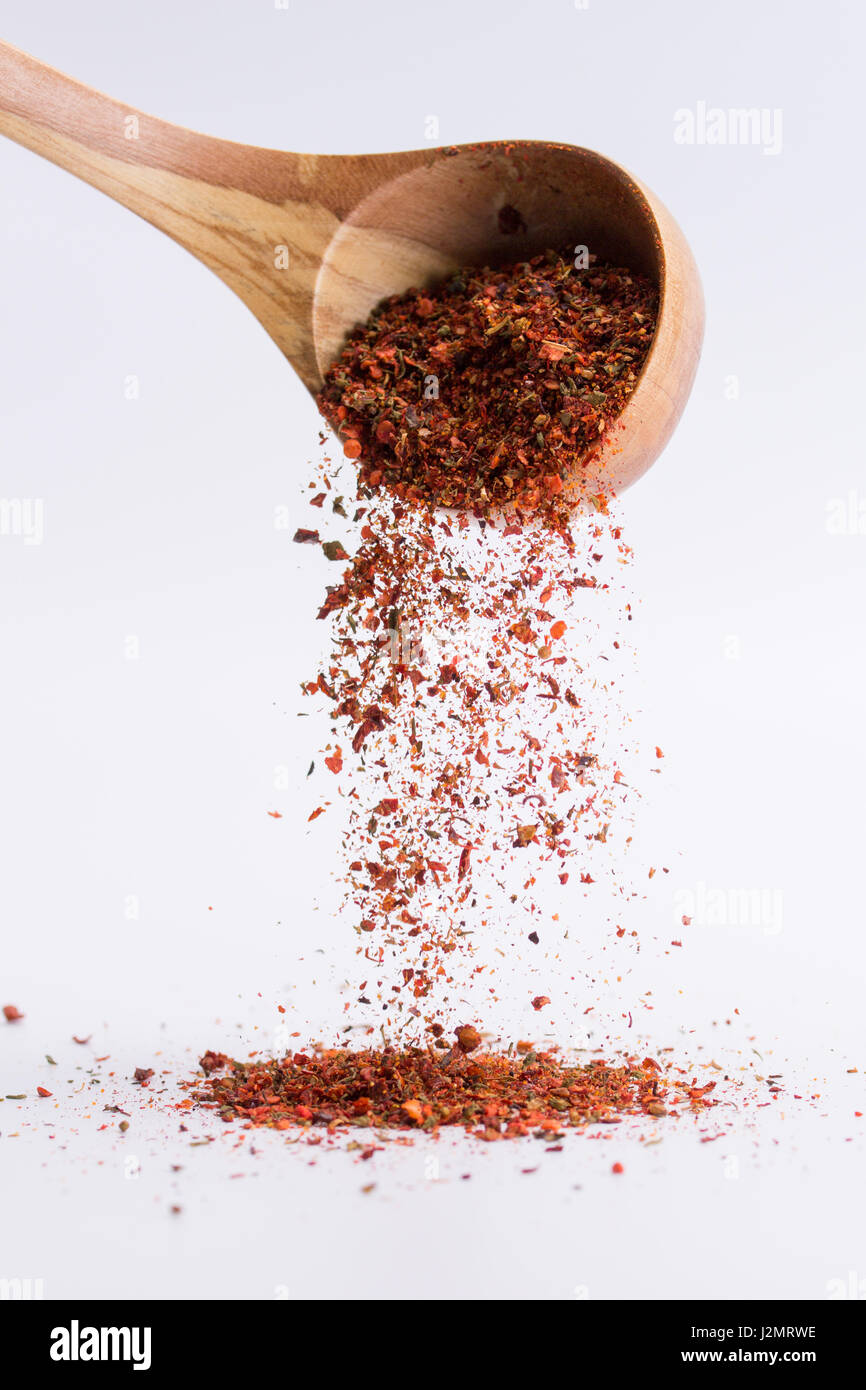 falling spices on a white background, isolated Stock Photo - Alamy