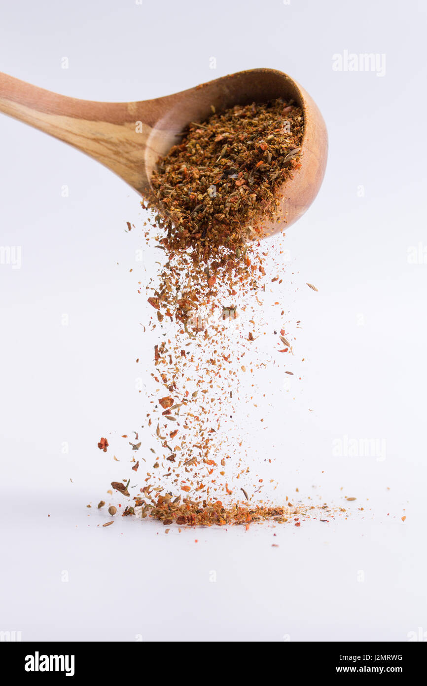 falling spices on a white background, isolated Stock Photo - Alamy