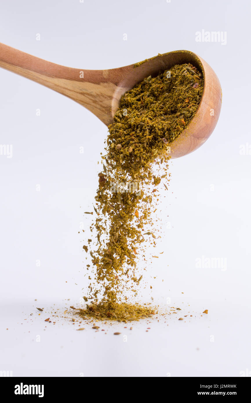 falling spices on a white background, isolated Stock Photo - Alamy