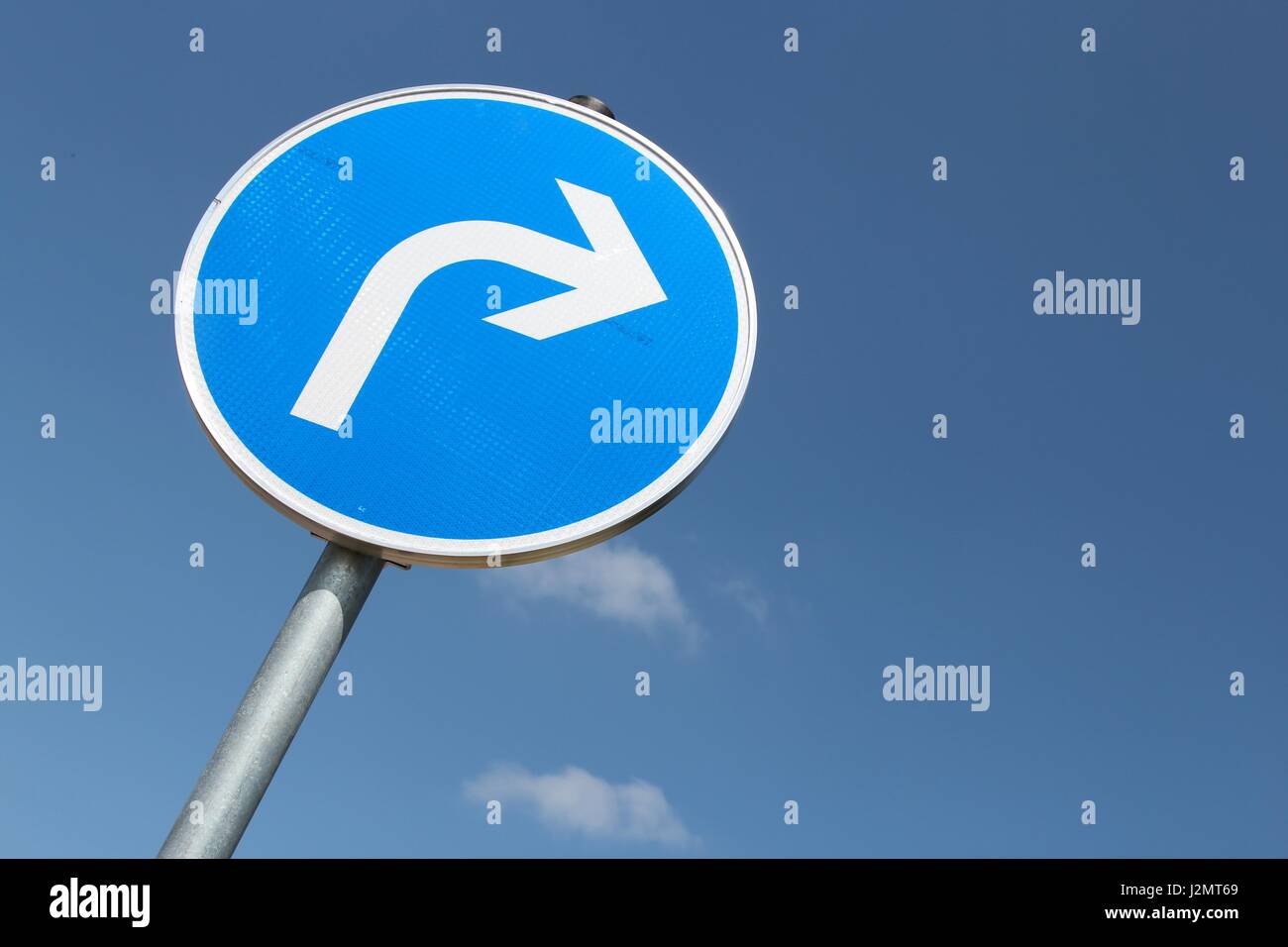 German road sign: turn right Stock Photo - Alamy