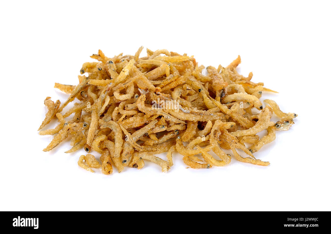 Tiny dried fish isolated on white background Stock Photo - Alamy