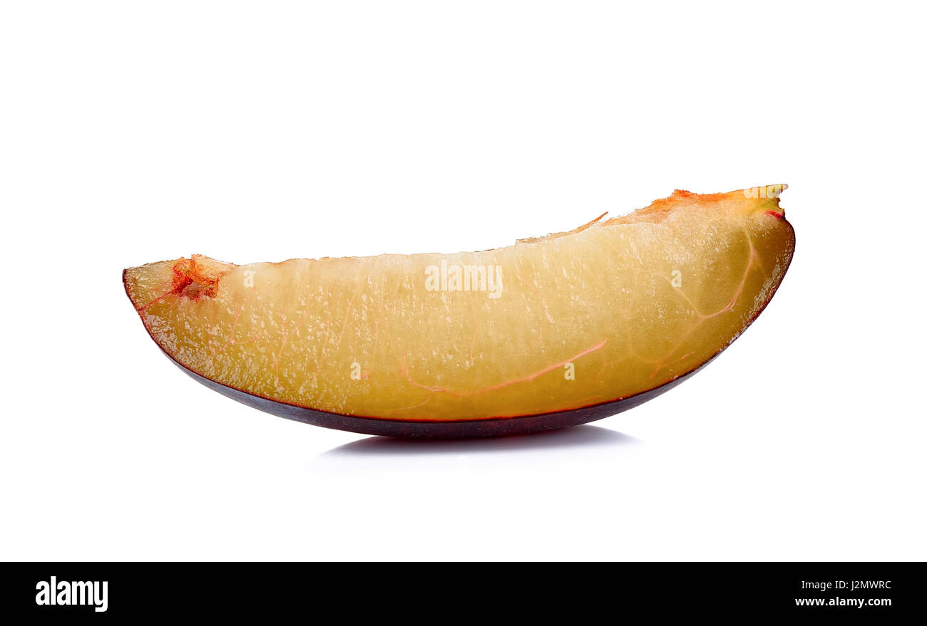 Slice of plum isolated on the white background Stock Photo - Alamy