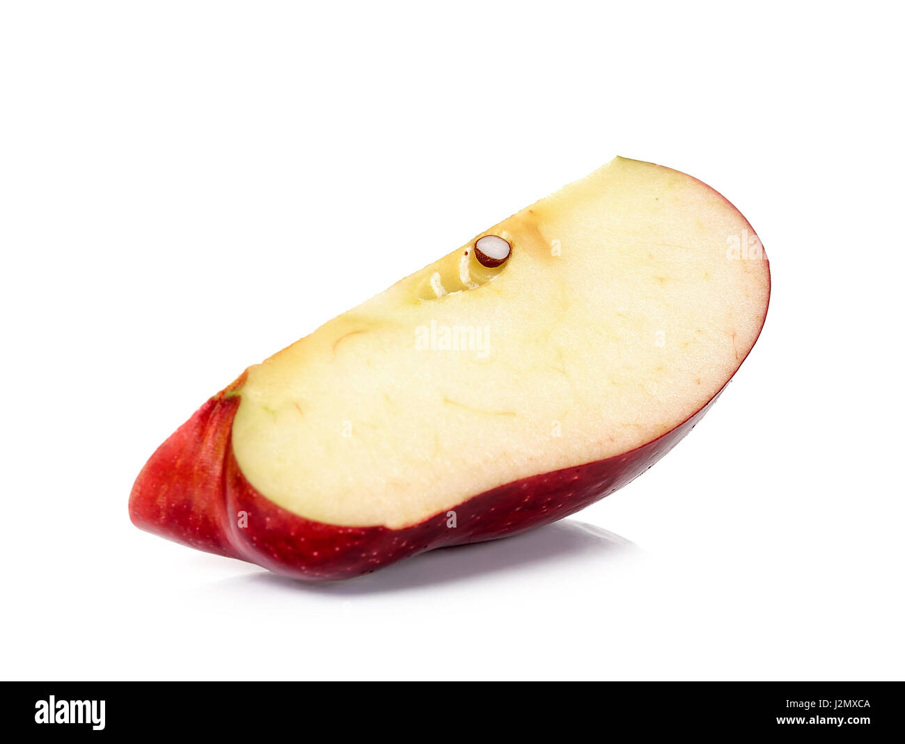 Slice red apple isolated on white background Stock Photo - Alamy