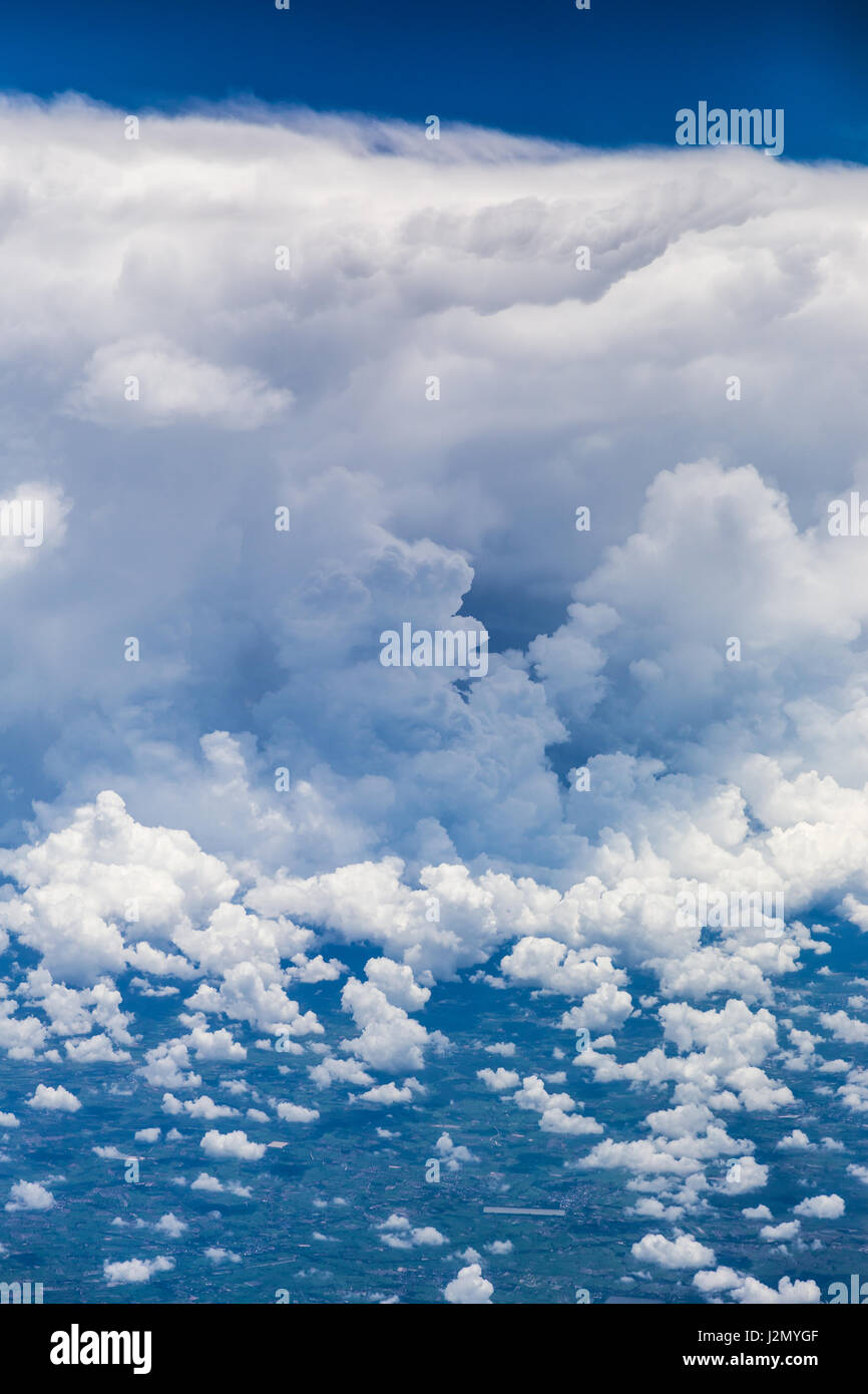 Aerial view of dramatic cloud formation and cityscape seen below Stock ...