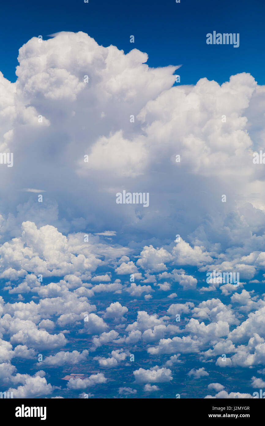 Aerial view of dramatic cloud formation and cityscape seen below Stock ...