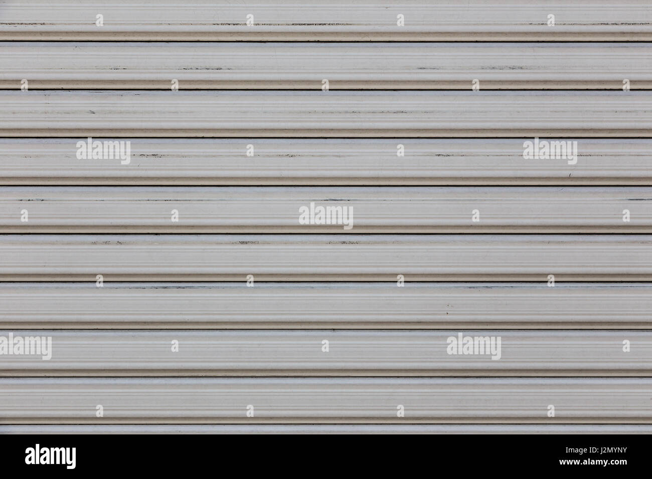 Roll metal shutter gate in gray color Stock Photo - Alamy
