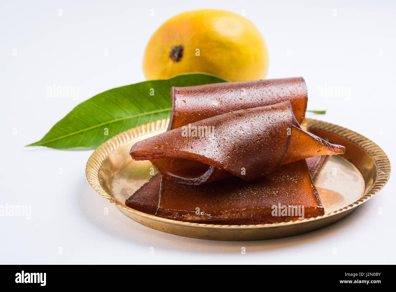 indian alphonso mango's dried jelly called mango papad or mango poli or ...