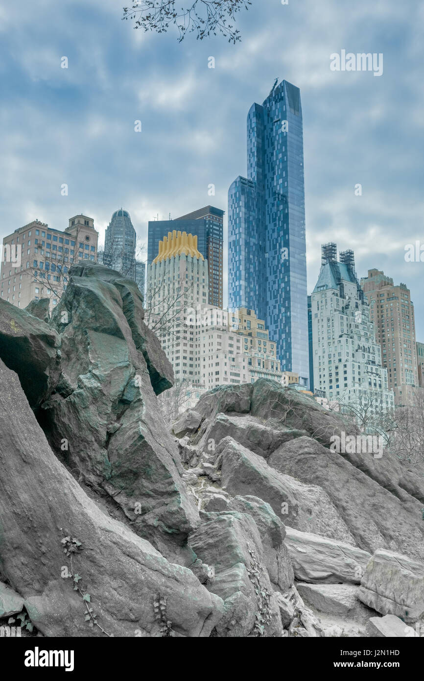 The growing Manhattan midtown Skyline behind the rocky outcrops of ...