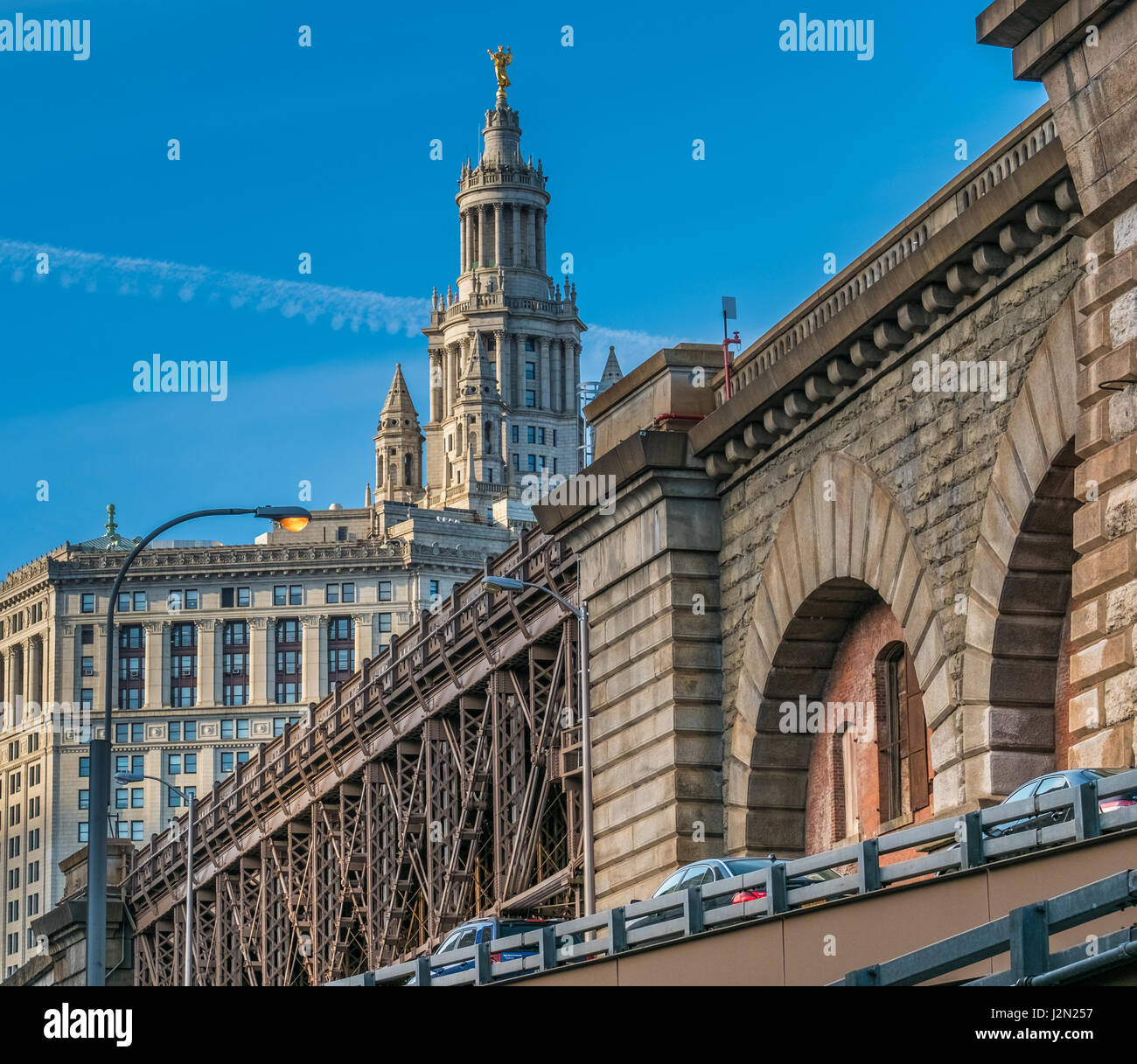 View of New York City's City Hall from the base of the Brooklyn Bridge ...