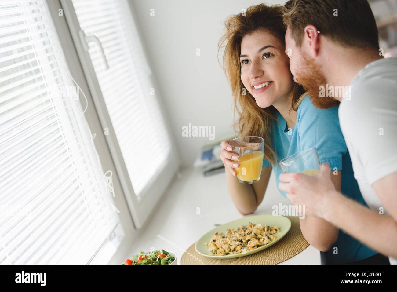 Couple in kitchen having romantic hi-res stock photography and images ...