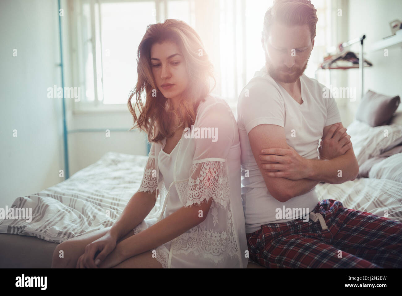 Frustrated couple arguing and having marriage problems Stock Photo - Alamy