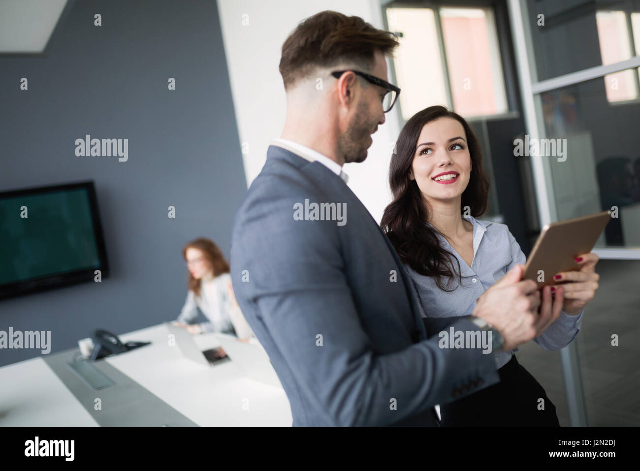 Young smart business people meeting in modern business office Stock ...