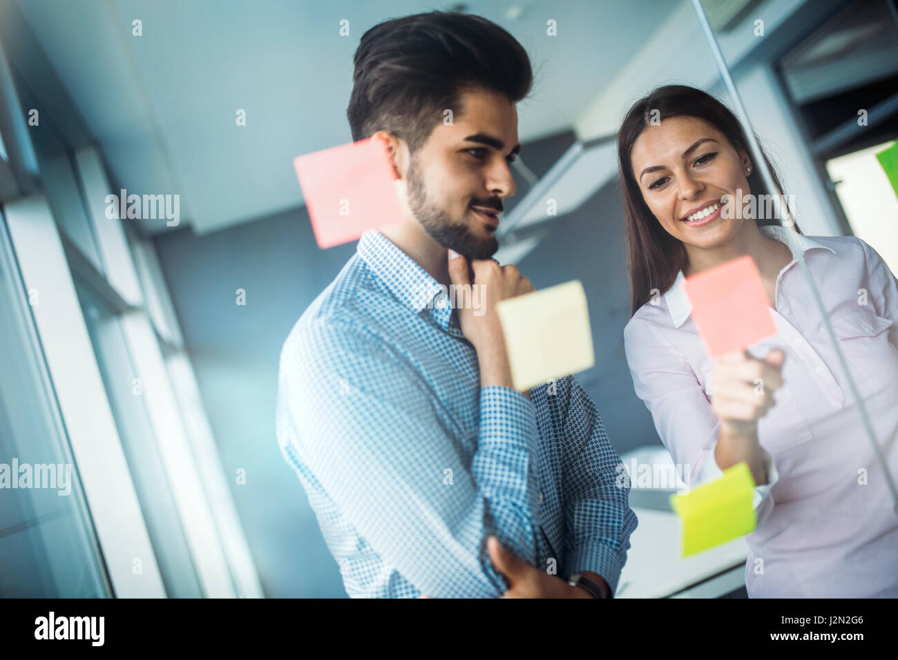 Creative professional business people working on business project in ...