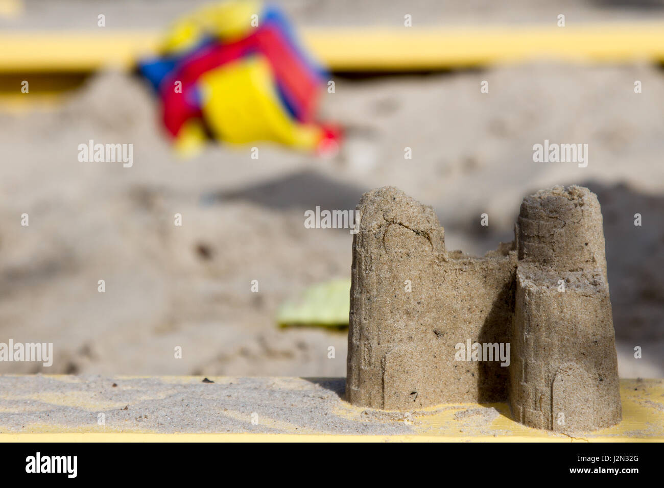 Sand castle in the children's sandbox photo Stock Photo - Alamy